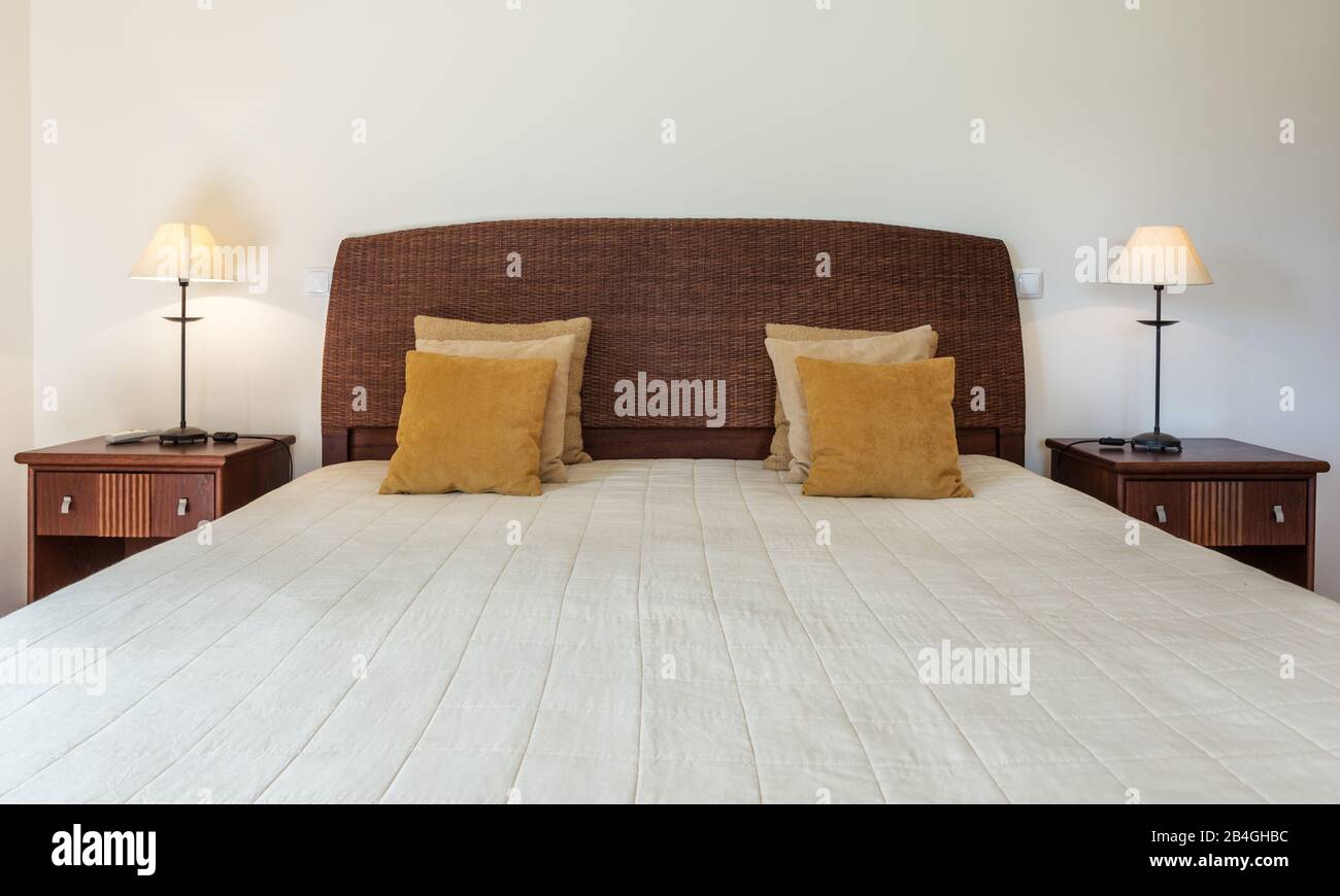 Bedroom in modern style with bed and pillows. Front view Stock Photo ...