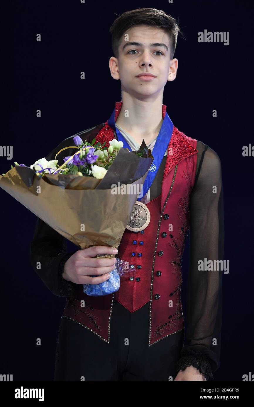 Men Awards, Petr GUMENNIK, RUS, at the ISU World Junior Figure Skating ...