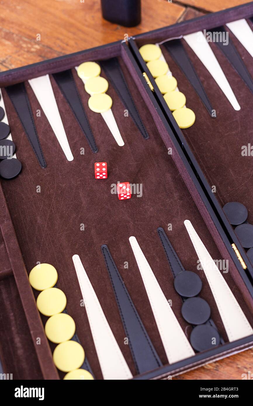 Wooden backgammon pieces hi-res stock photography and images - Alamy