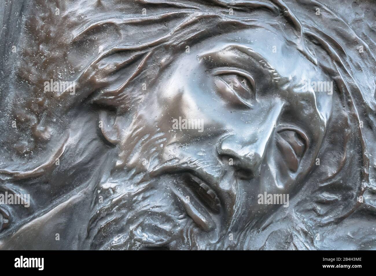 Bas-relief of Jesus crowned with thorns. High relief face of Jesus ...