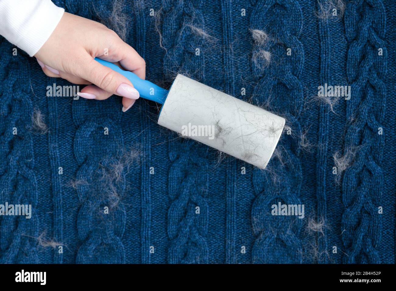 Sticky tape clothing fluff hi-res stock photography and images - Alamy