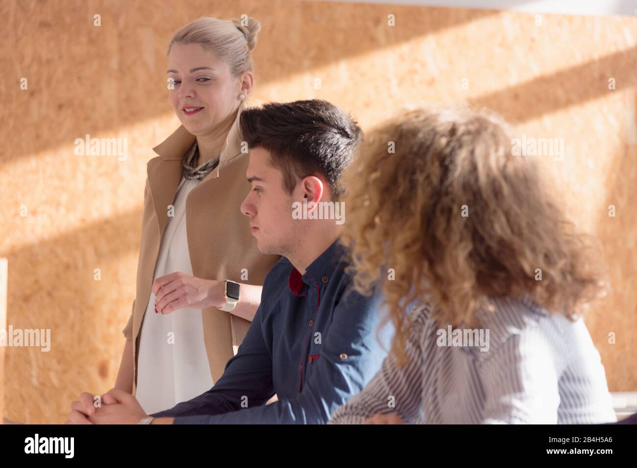 Female Architecture teacher at work. Female professor explain ...