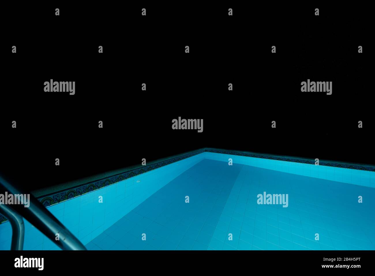Swimming pool at night, architecture, blue water Stock Photo - Alamy