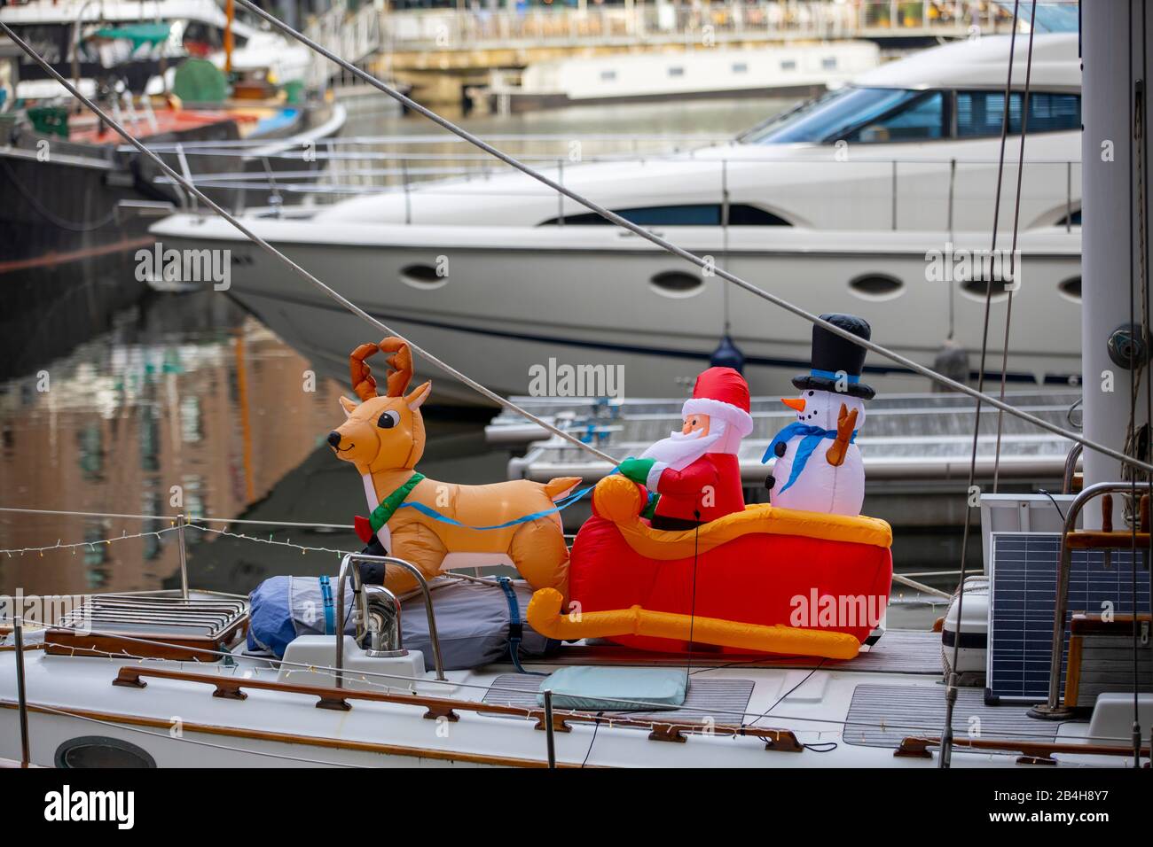 Santa in a boat hi-res stock photography and images - Alamy
