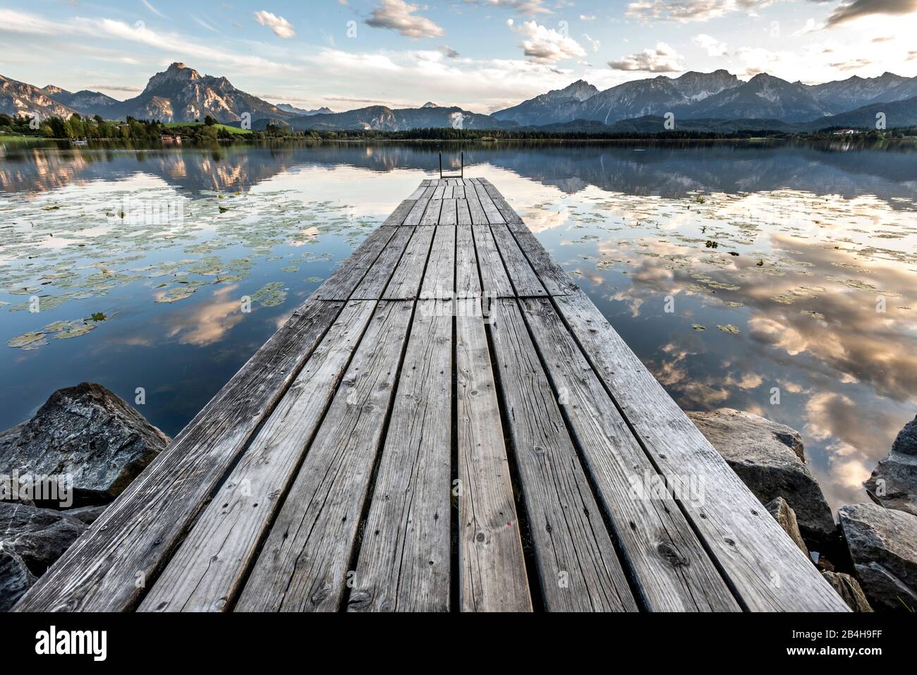 Symmetrical view of jetty on lake hi-res stock photography and images ...