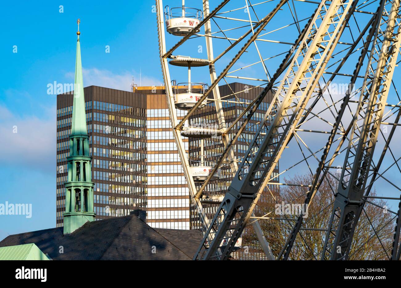 Ferris wheel, with open gondolas, blue sky, on the castle square in ...
