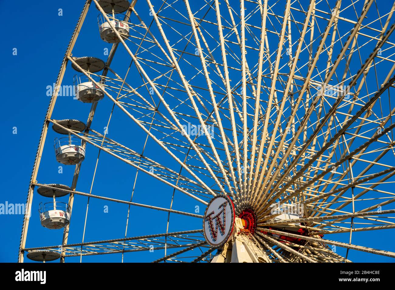 Ferris wheel, with open gondolas, blue sky, on the castle square in ...