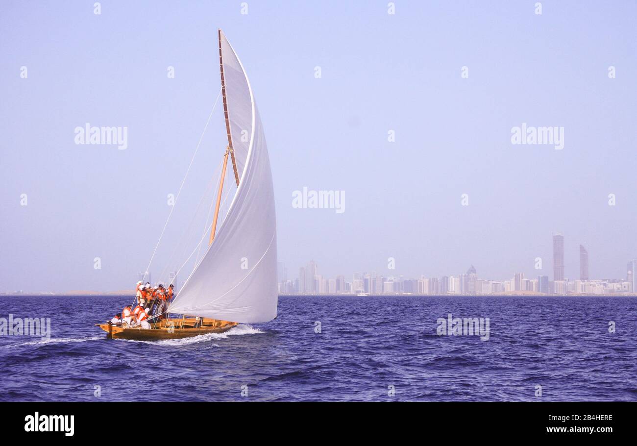 Traditional sailing dhows race at Abu Dhabi at Ghanada Dhow Sailing ...