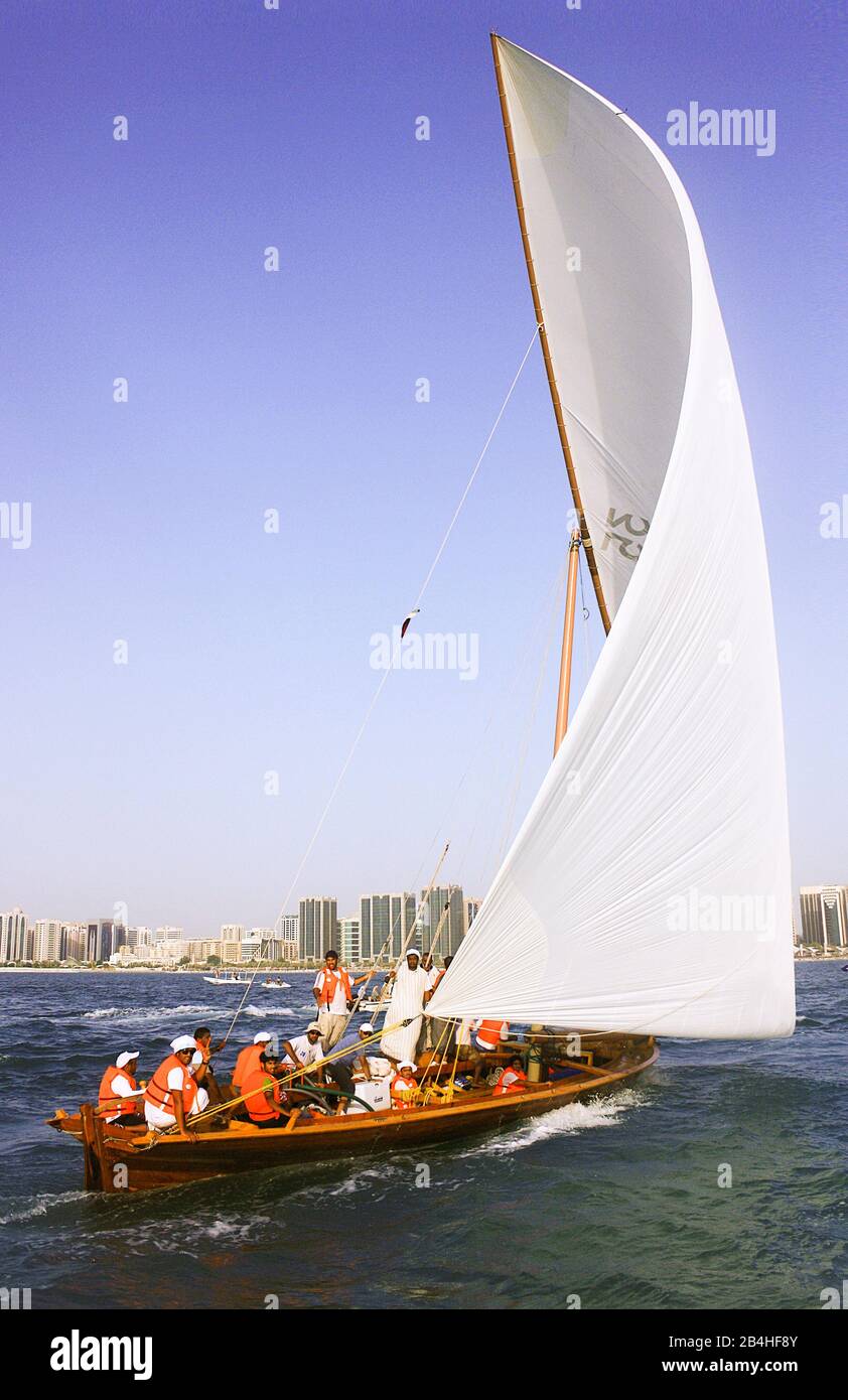 Traditional sailing dhows race at Abu Dhabi at Ghanada Dhow Sailing ...