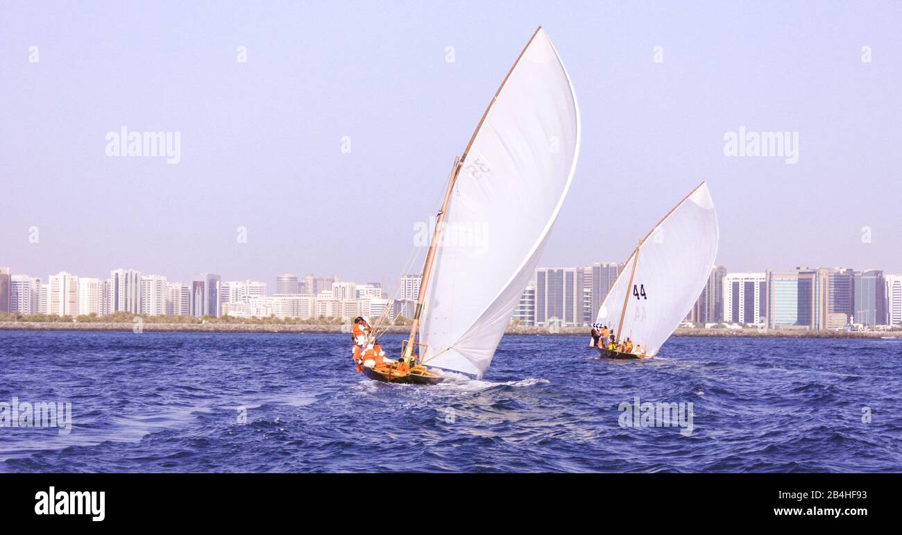 Traditional sailing dhows race at Abu Dhabi at Ghanada Dhow Sailing ...