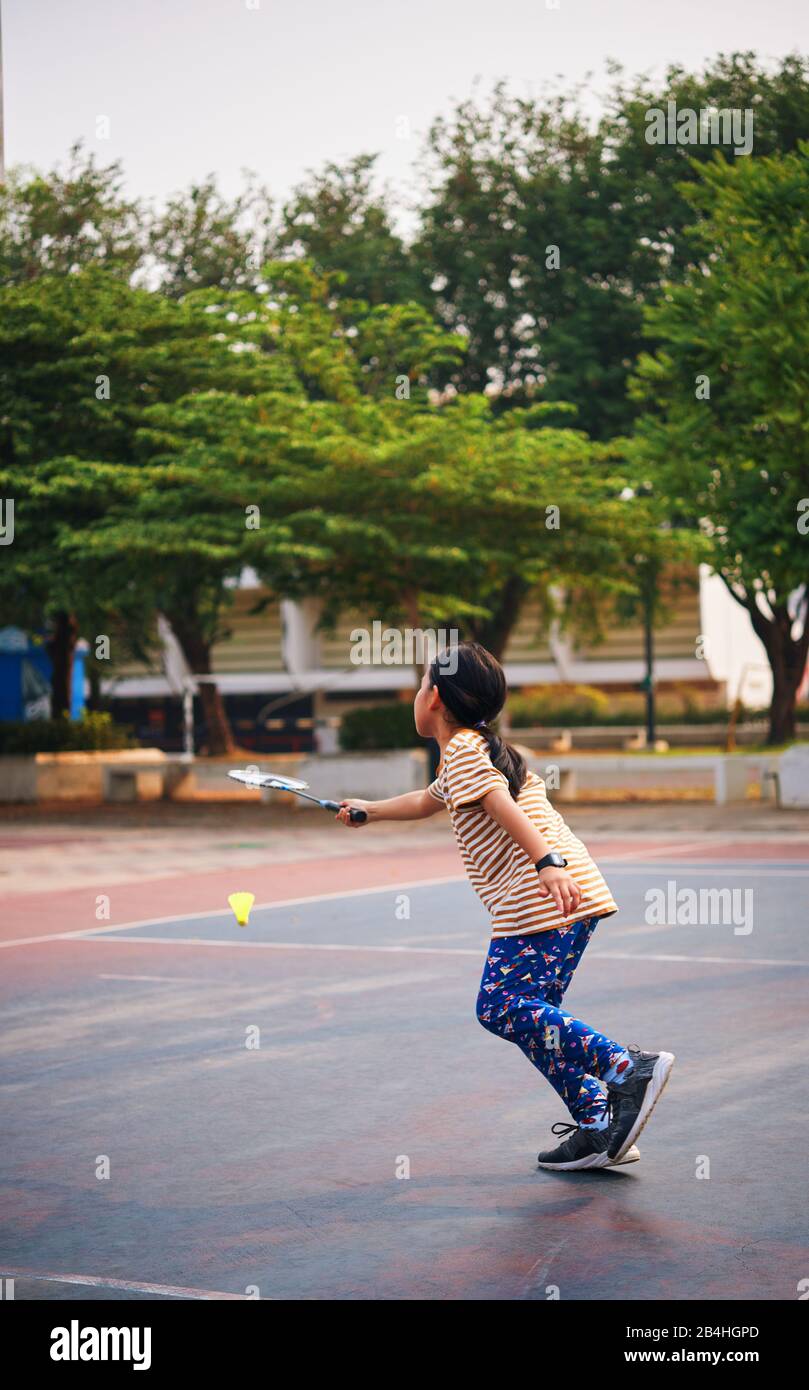 A girl practice the badminton Stock Photo - Alamy