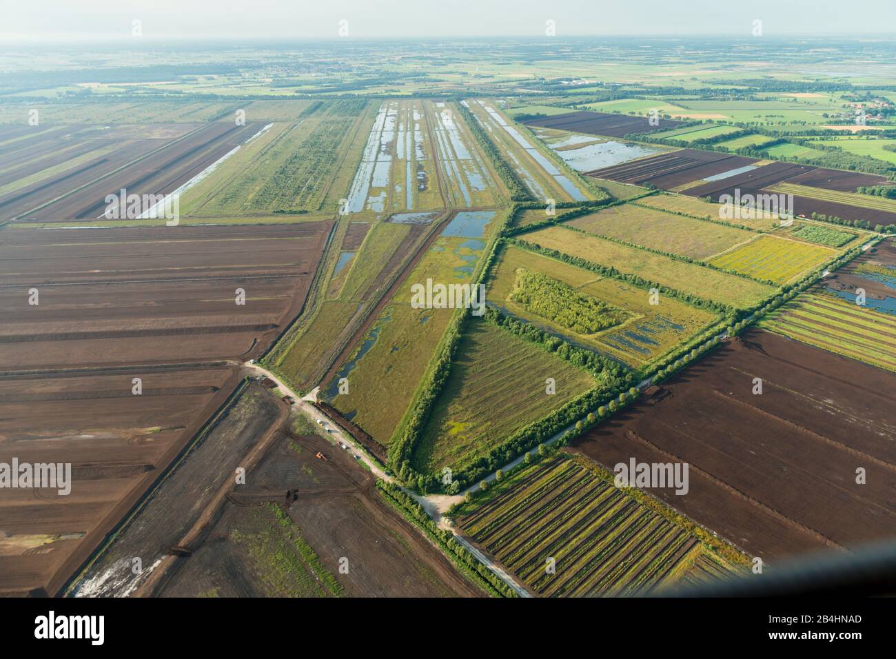 Run recording of renaturation after open pit, fields and water Stock ...