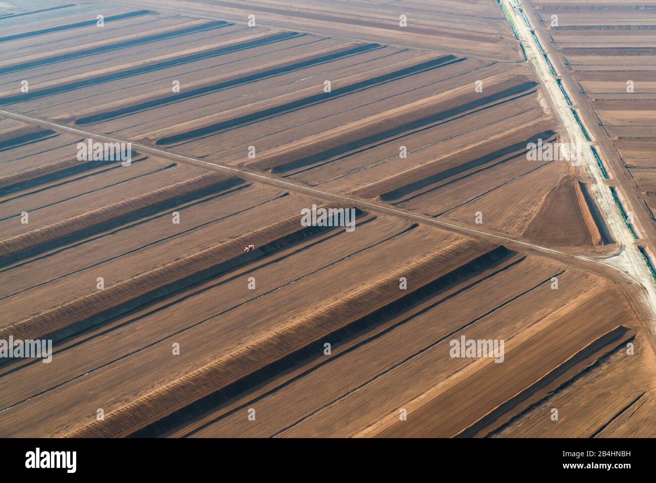 Aerial view of an excavated earth surface by open pit mining Stock ...