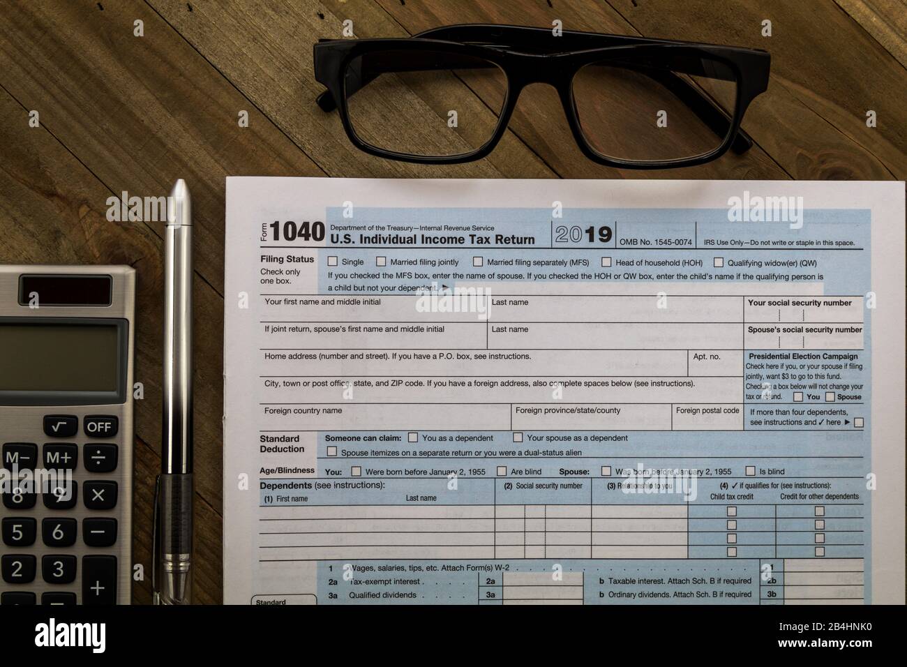 Tax Form 1040 for 2019 business concept flat lay wooden board Stock ...