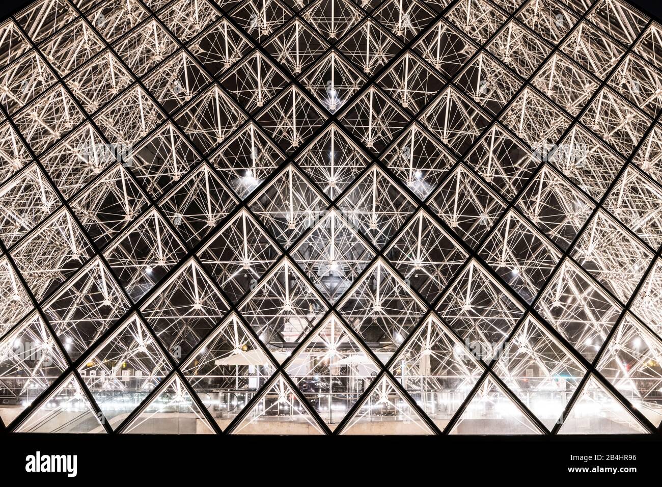 Glass pyramid lit at night in the Louvre, Paris, France, Europe Stock ...