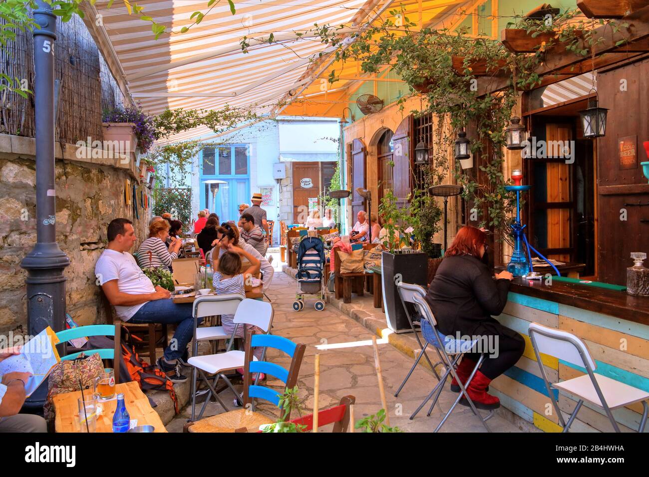 Old town street with restaurant tables Limassol, Bay of Akrotiri ...