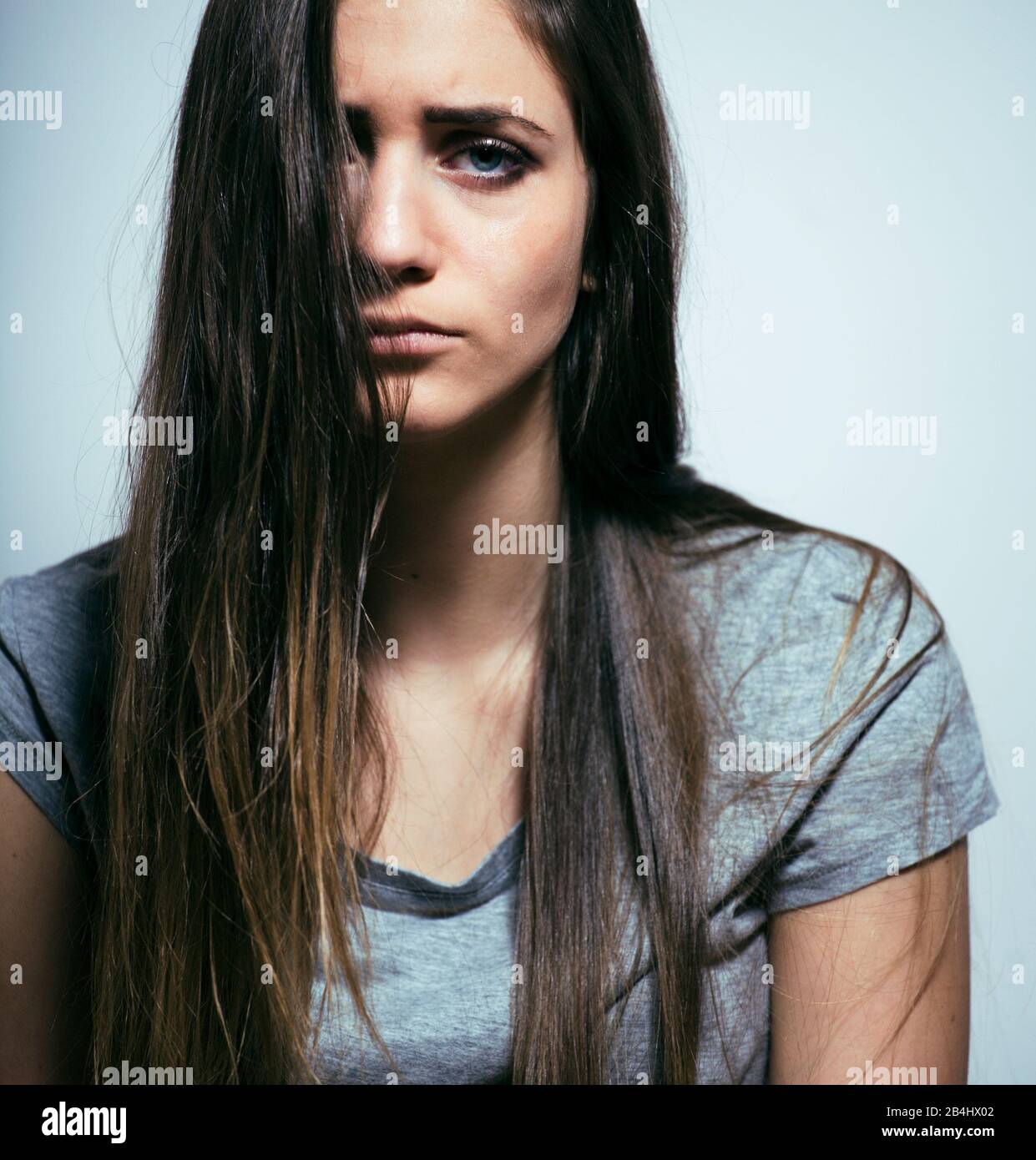 problem depressed teenage with messed hair and sad face Stock Photo - Alamy