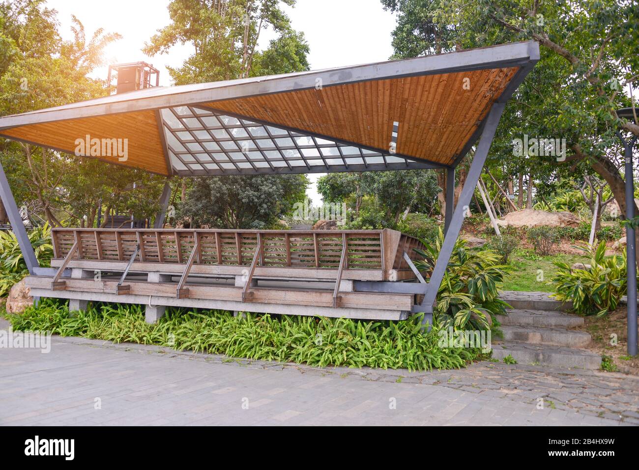 Pavilion in the Dengdu Wet Land Park with sunlight at sunset, Zhongshan ...