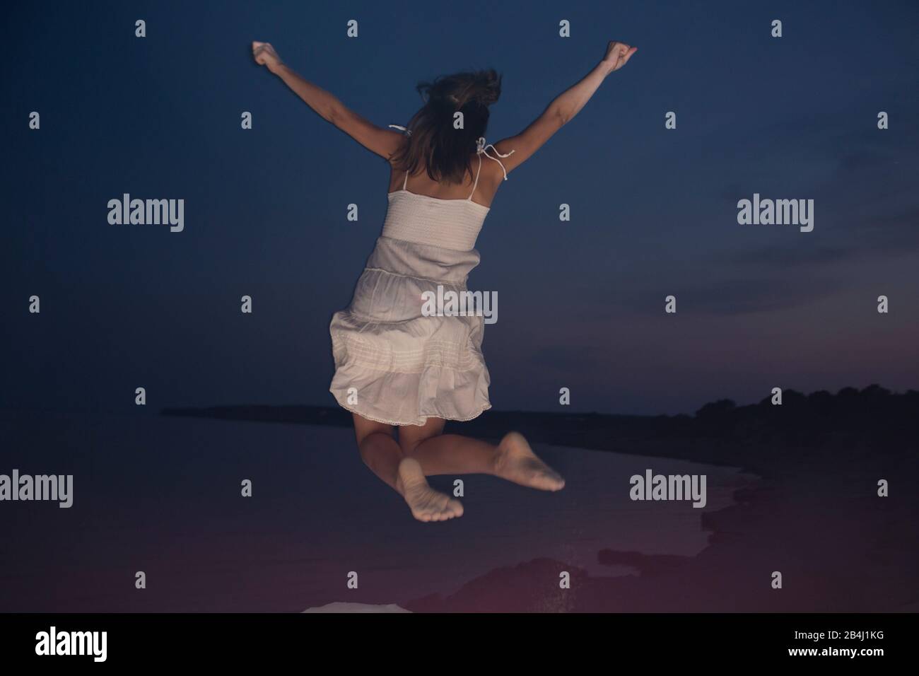Night, bounce, girl, sea Stock Photo - Alamy