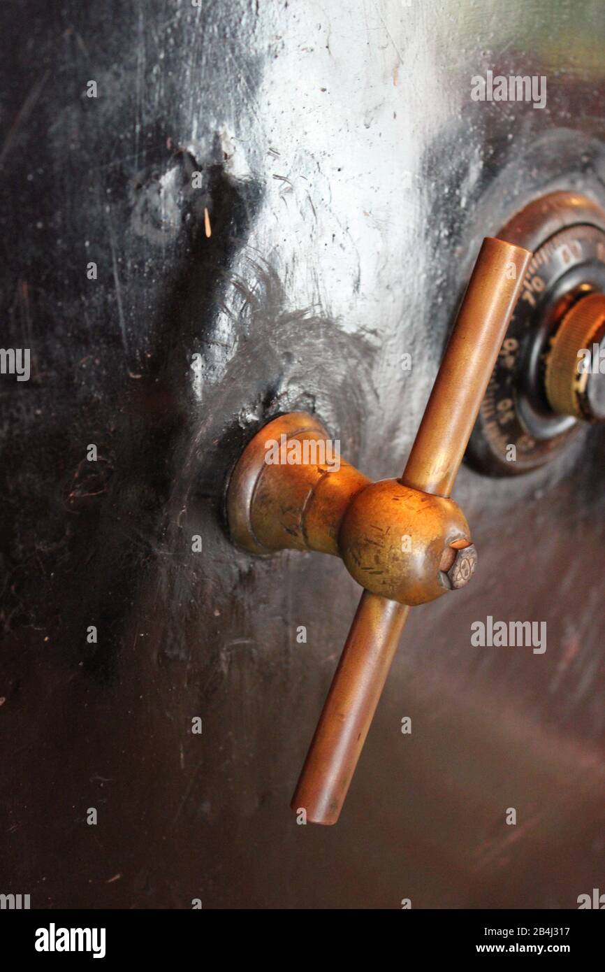 Large vintage safe with handle and combination lock Stock Photo - Alamy