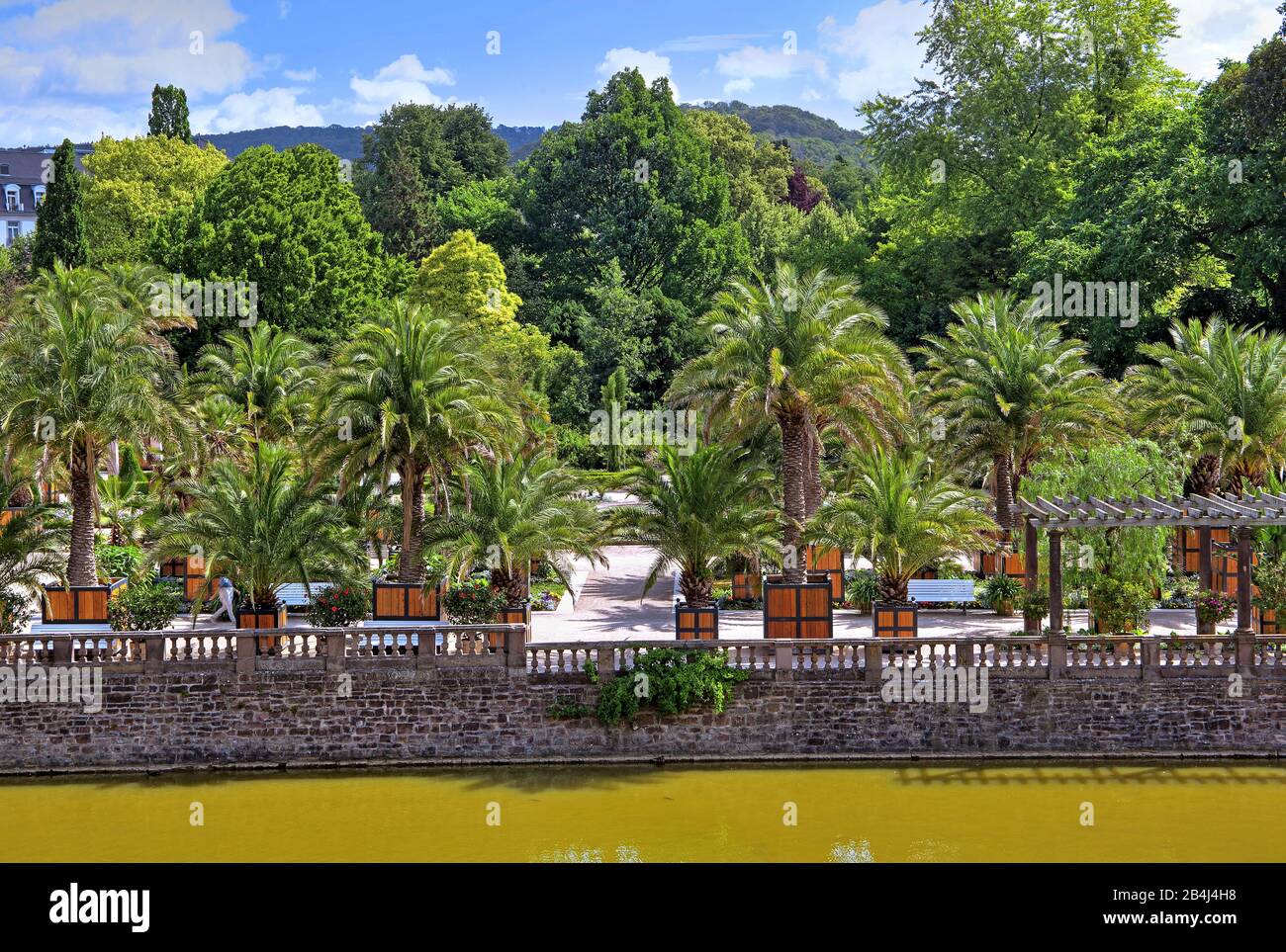 Castle moat with palm garden in the spa park Bad Pyrmont, Staatsbad ...