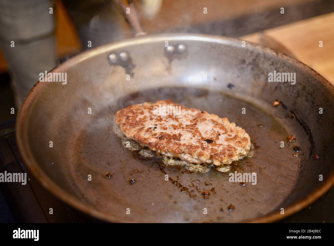 Pan fried, vegan, plant-based protein (fake meat) "pork" patty for ...