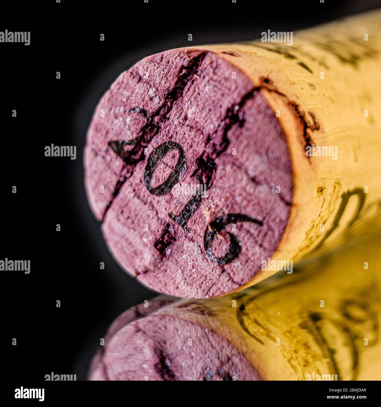 A cork close-up in a black background and mirror Stock Photo - Alamy
