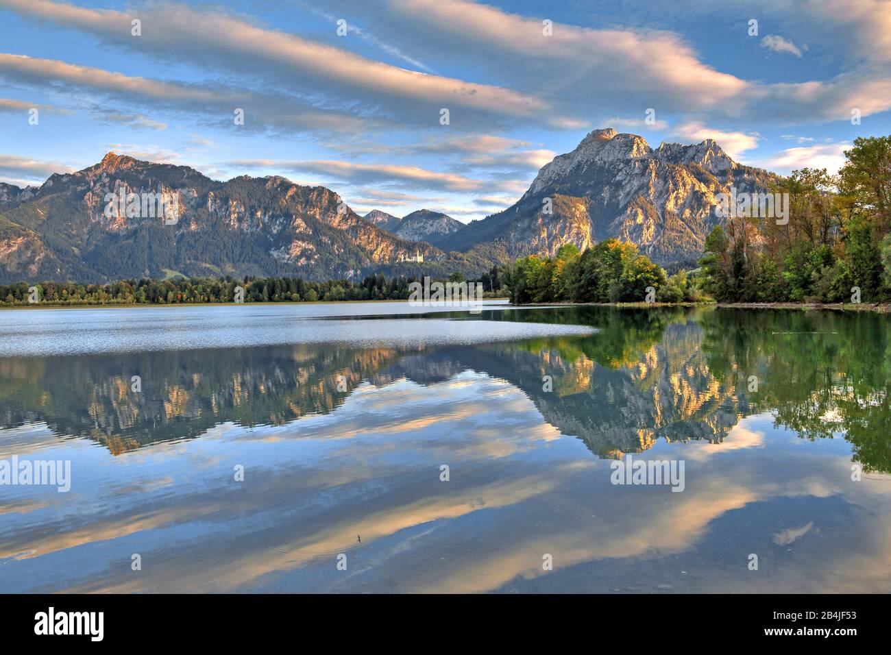 Mountain landscape at forggensee with neuschwanstein castle hi-res ...