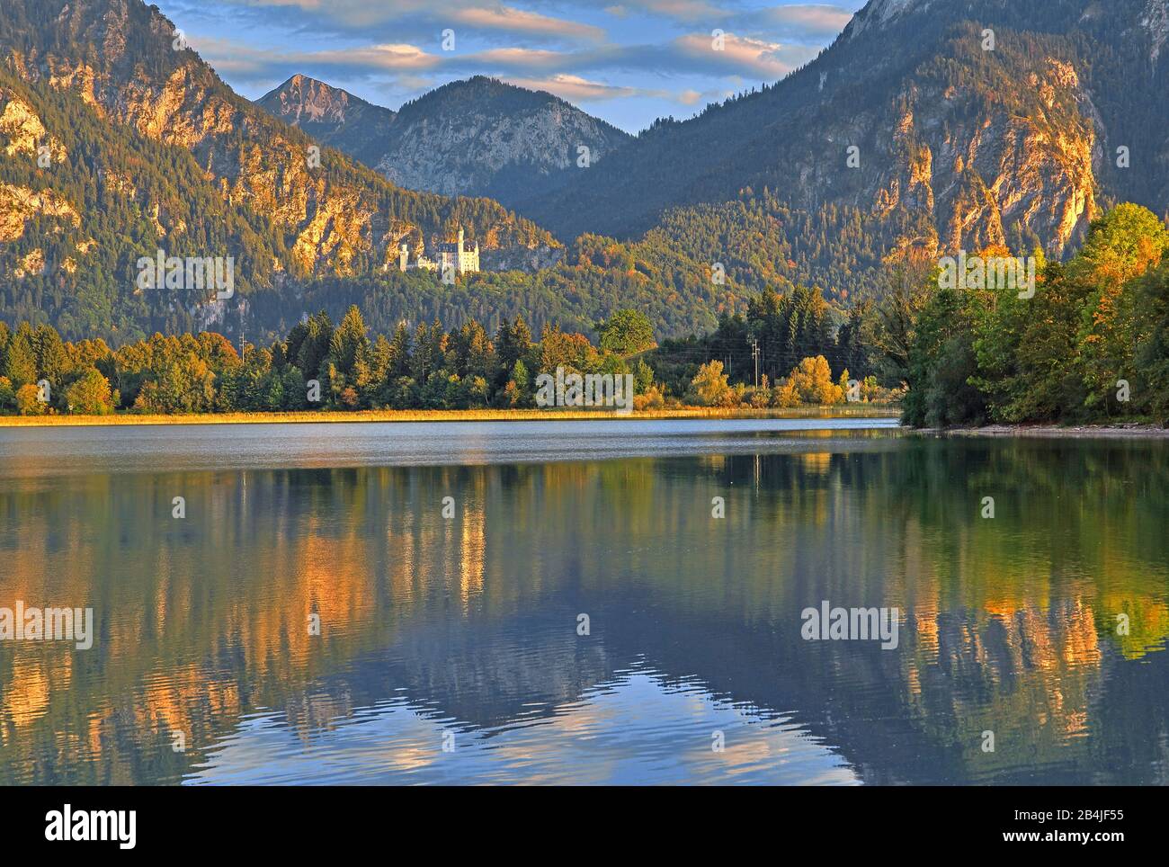 Mountain landscape at Forggensee with Neuschwanstein Castle, Füssen ...