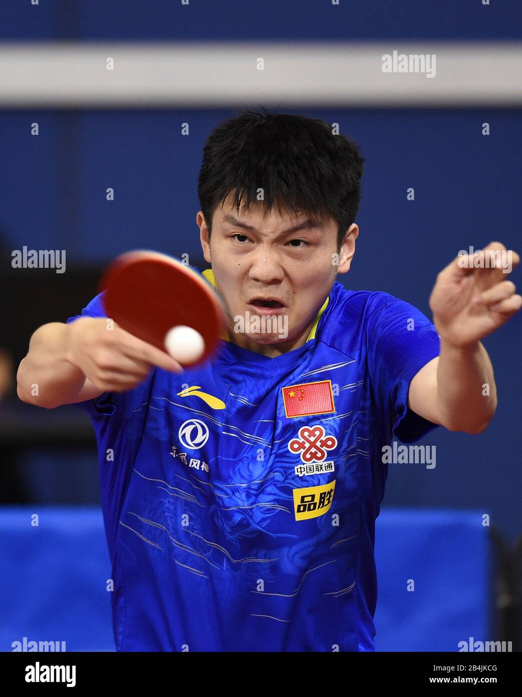 Doha. 6th Mar, 2020. Fan Zhendong of China hits a return during the men ...