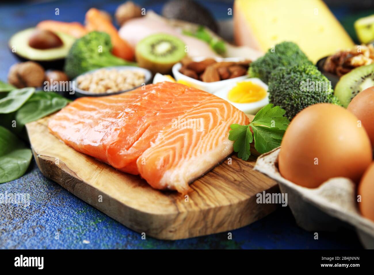 healthy eating and diet concept - natural rich in protein food on table ...