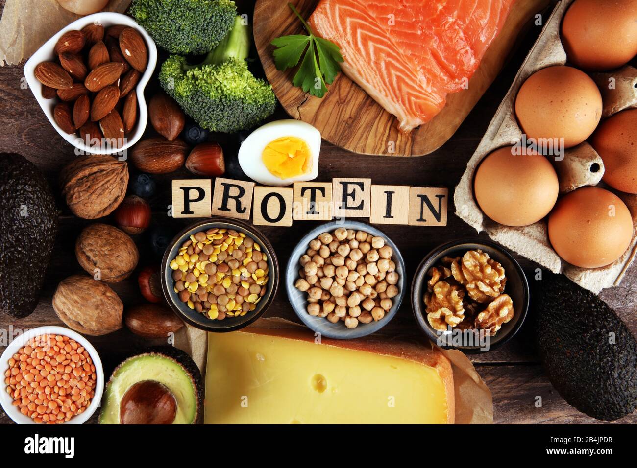 healthy eating and diet concept - natural rich in protein food on table ...