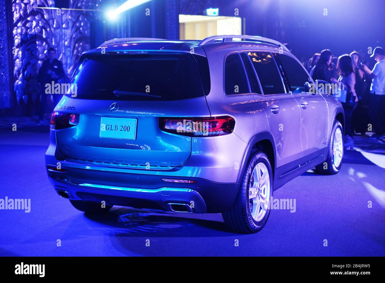 Back side of new Benz model on stage Stock Photo - Alamy