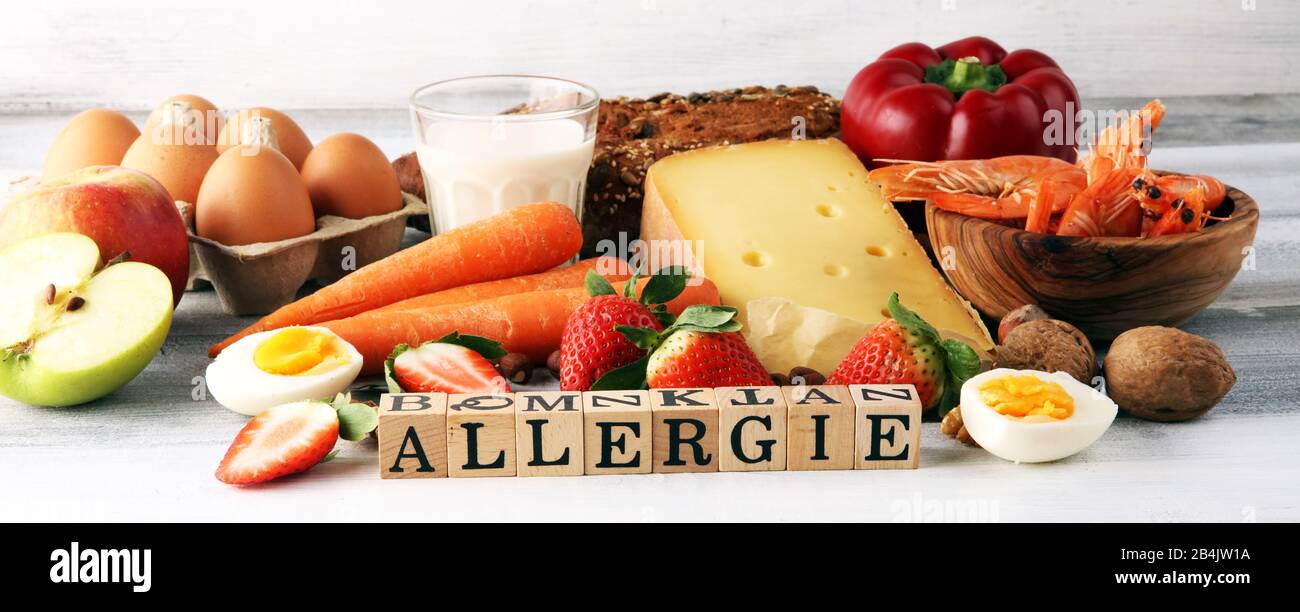 Allergy food concept. Allergy food as almonds, milk, cheese, strawberry ...