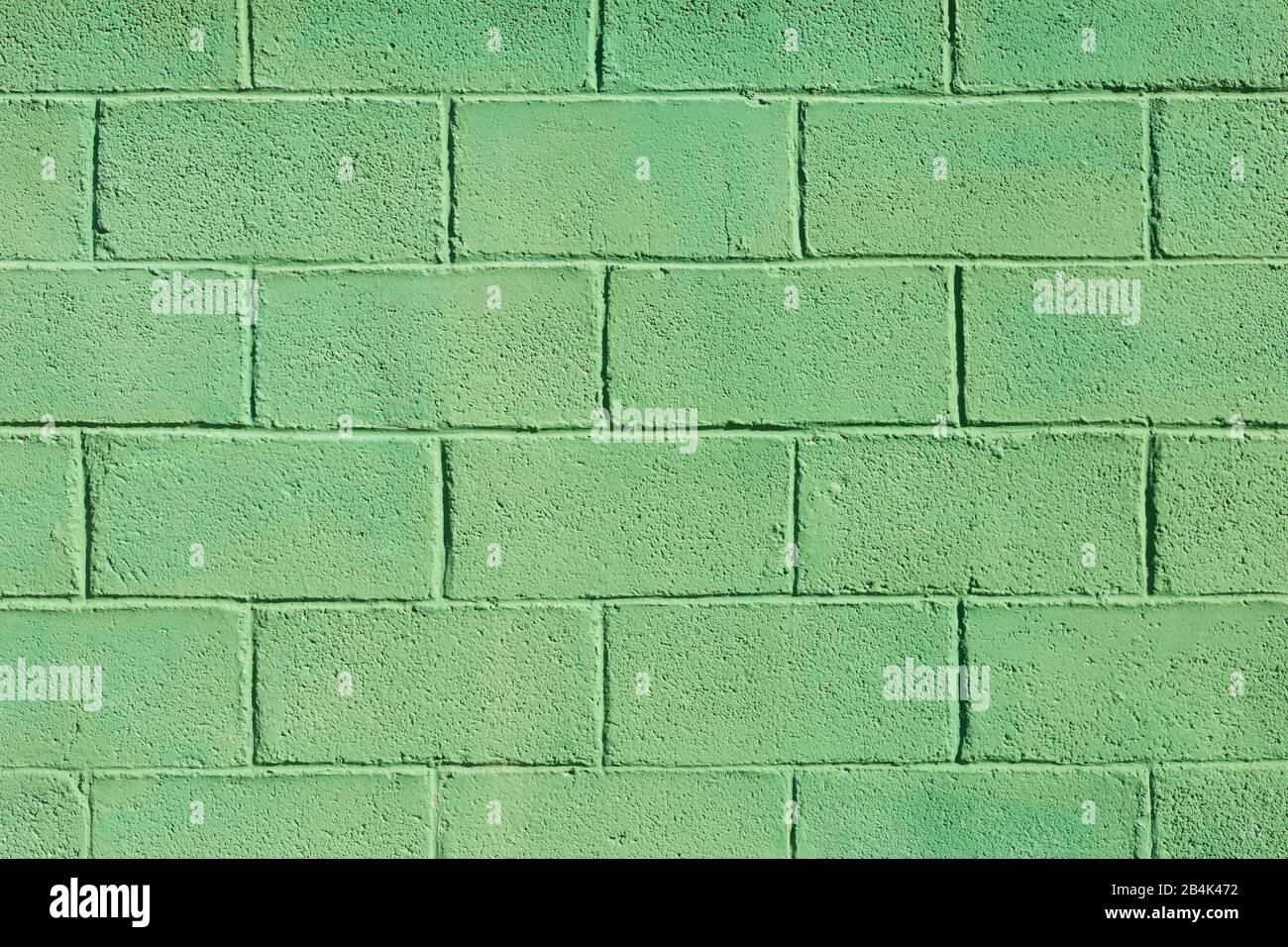 wall of rectangular blocks painted green Stock Photo - Alamy