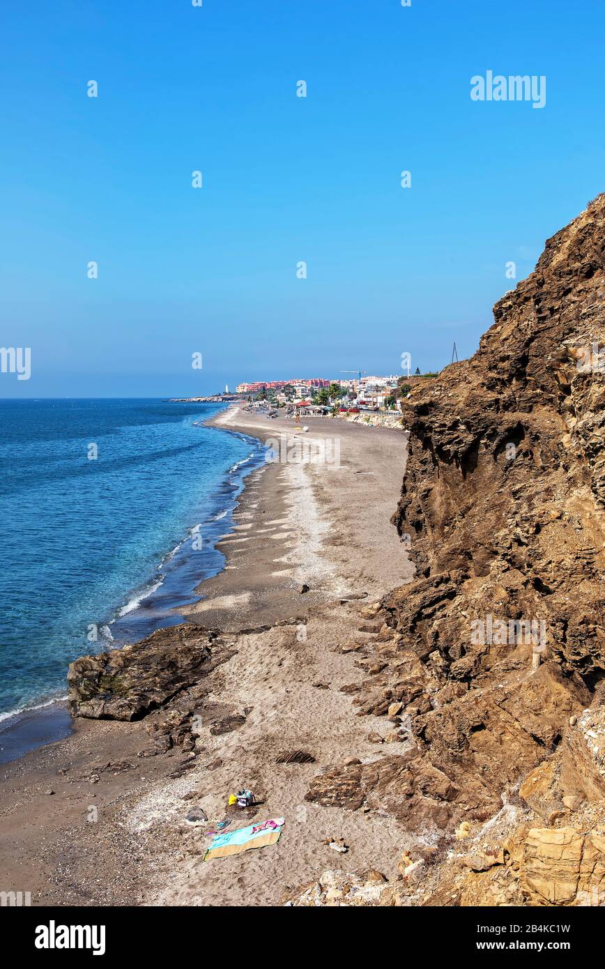 Rock and beach at Torrox Costa Stock Photo - Alamy