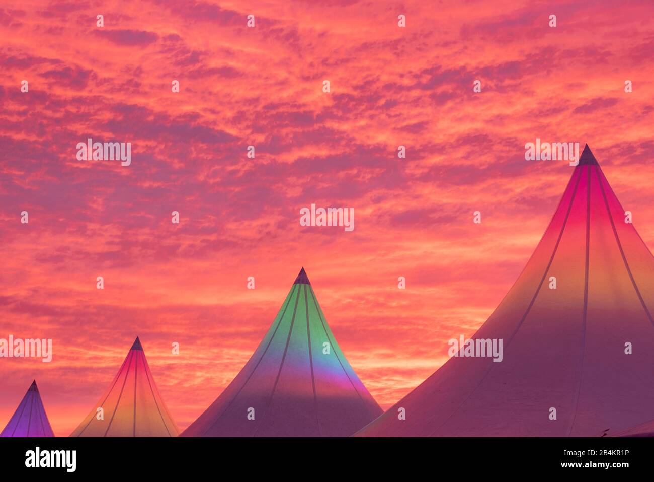 Tents, red sky, sunrise, color explosion Stock Photo - Alamy