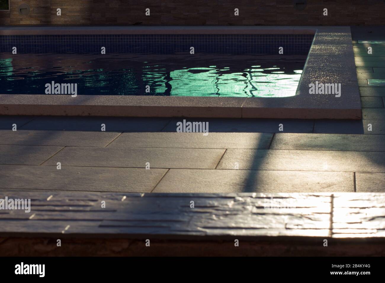 Pool in the sunrise Stock Photo - Alamy