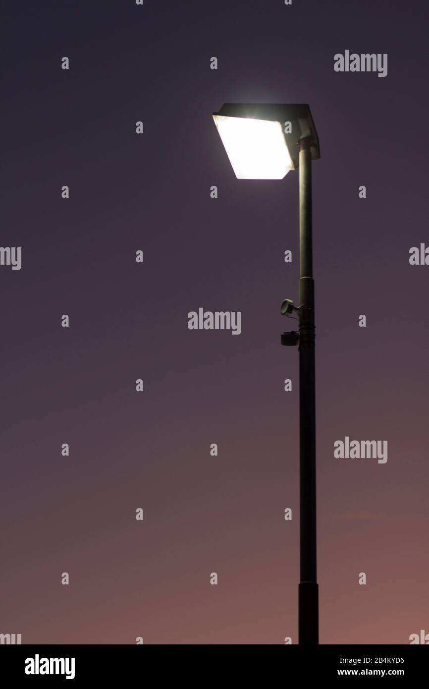 Street lights in the sunset Stock Photo - Alamy