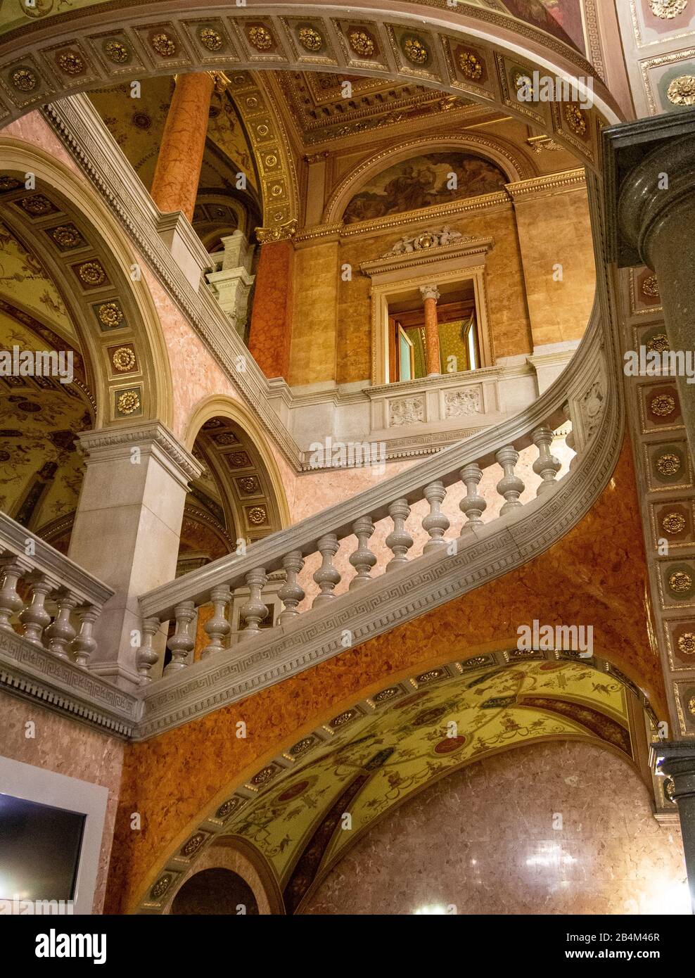 Opera Exuberance: An elegant stone staircase winds up to the second ...