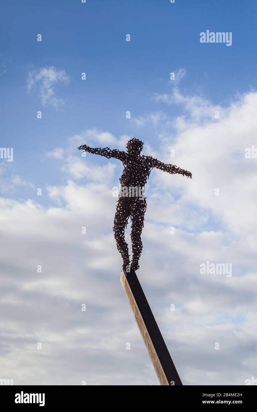 Beachfront statue of human figure made of metal cable hi-res stock ...