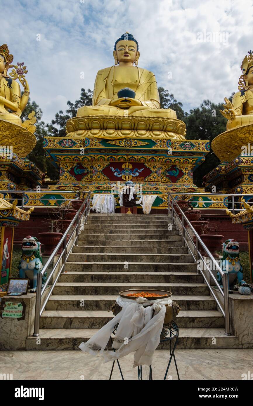 Lotus throne and one of the golden statue in Buddha Park, Swayambhunath ...