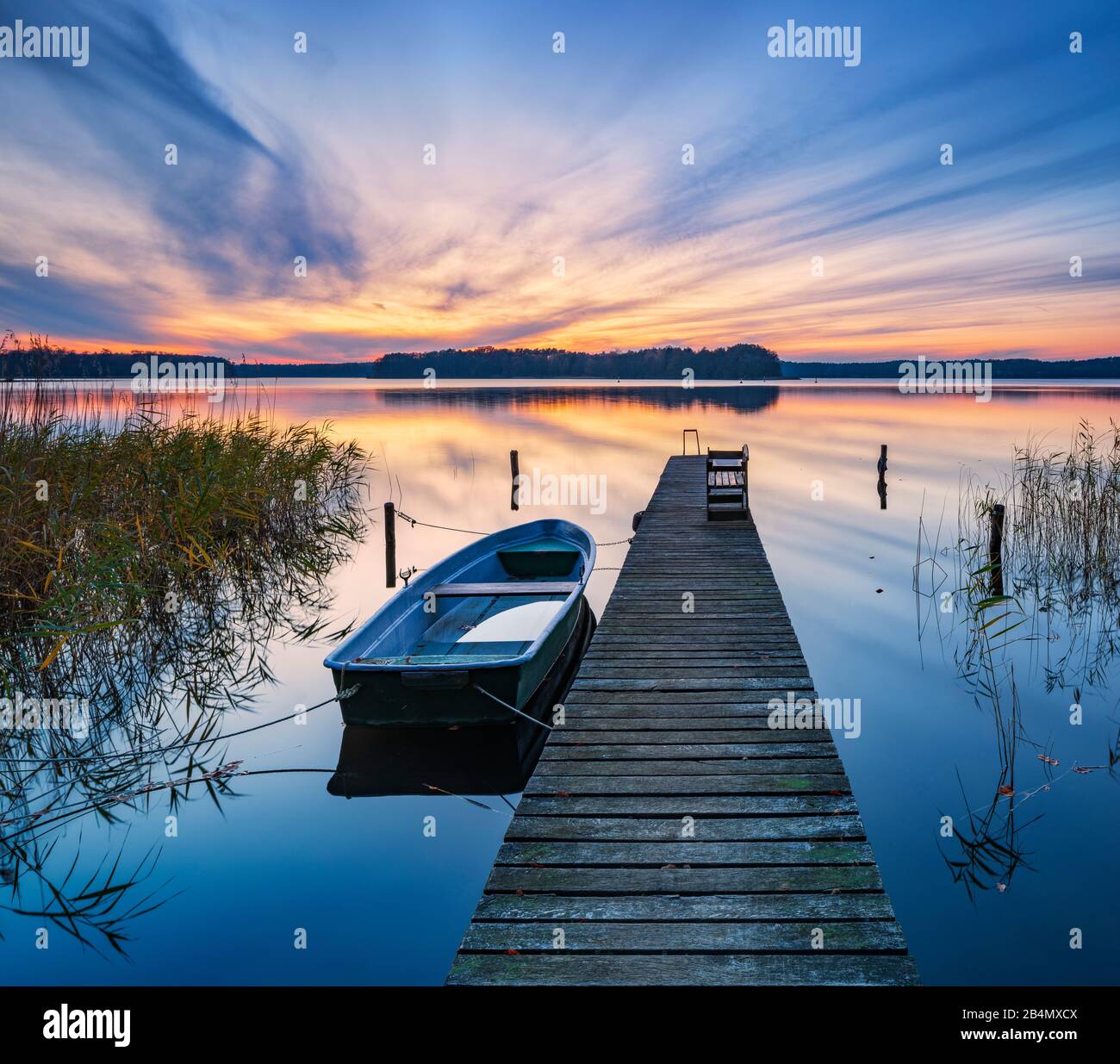 Rowing boat in dusk hi-res stock photography and images - Alamy