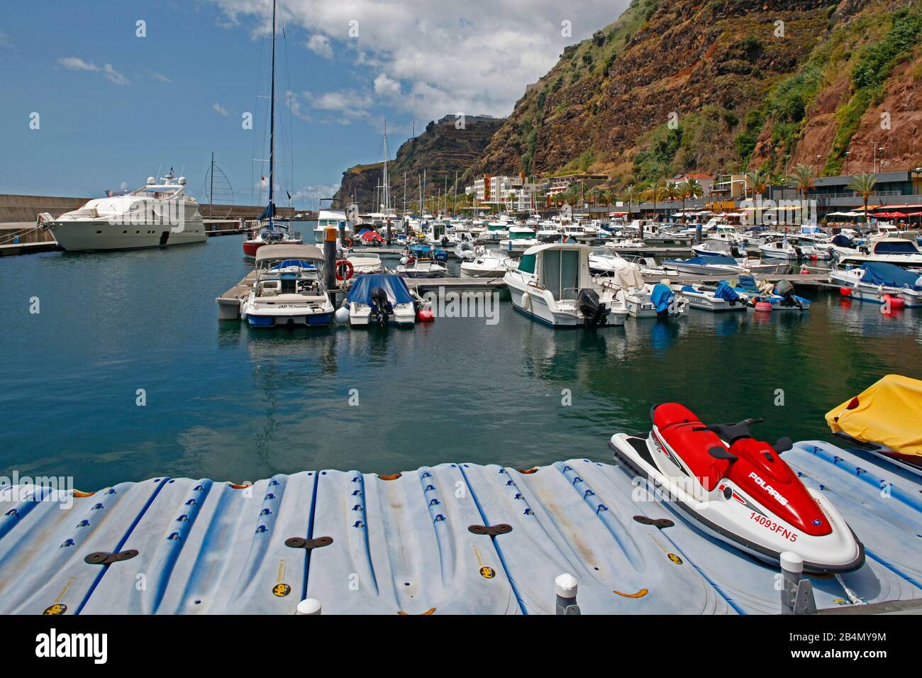 Calheta fishing and marina, in the background: Hotel Calheta Beach ...