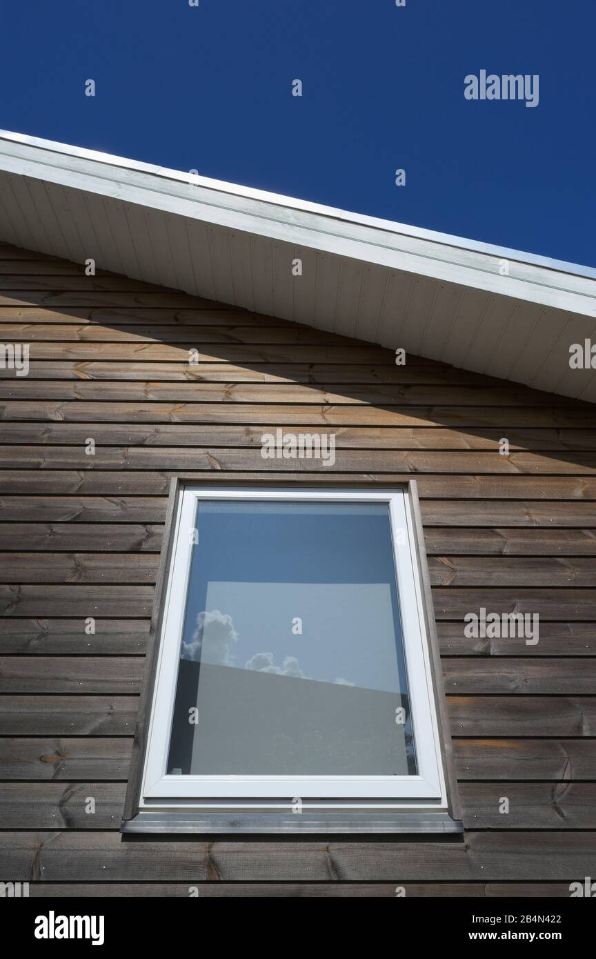 Wooden panels with window on house facade hi-res stock photography and ...