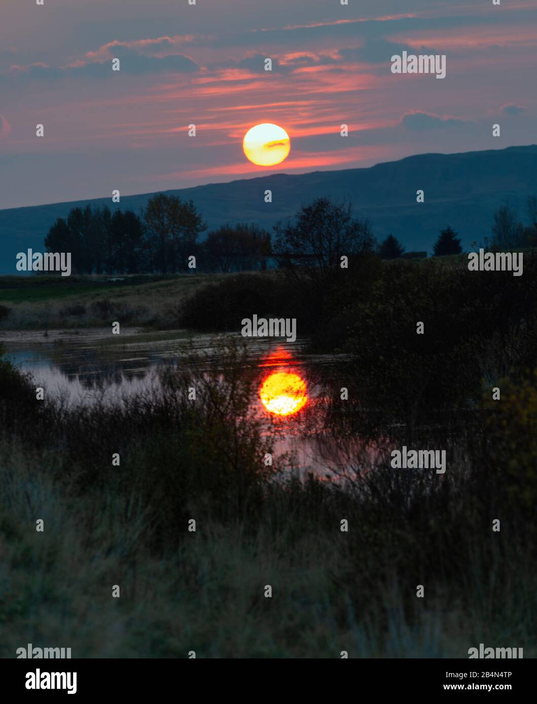 Iceland, driving inland with a full moon Stock Photo - Alamy