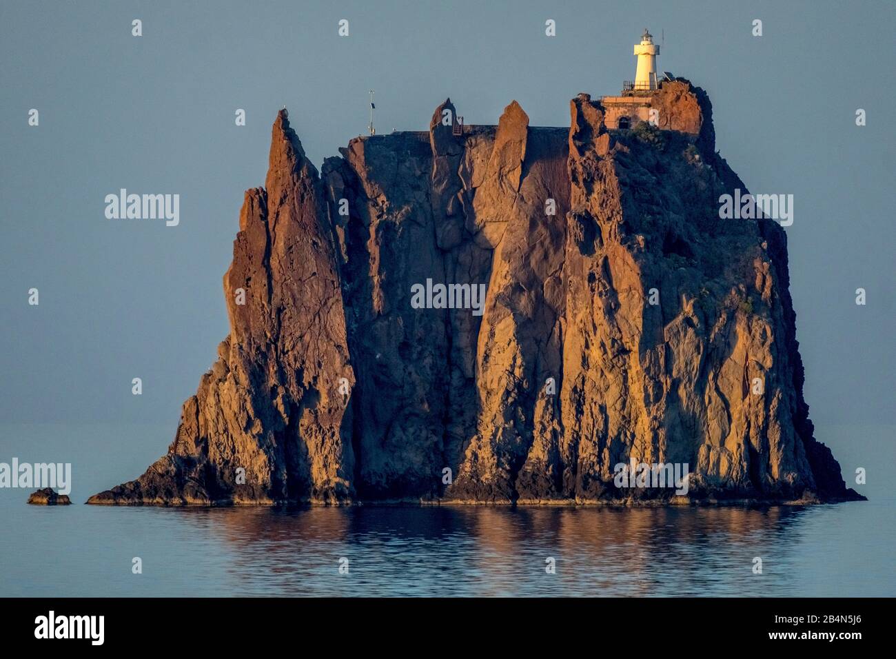 Strombolicchio, the tower-like cliff in front of the Stromboli volcano ...