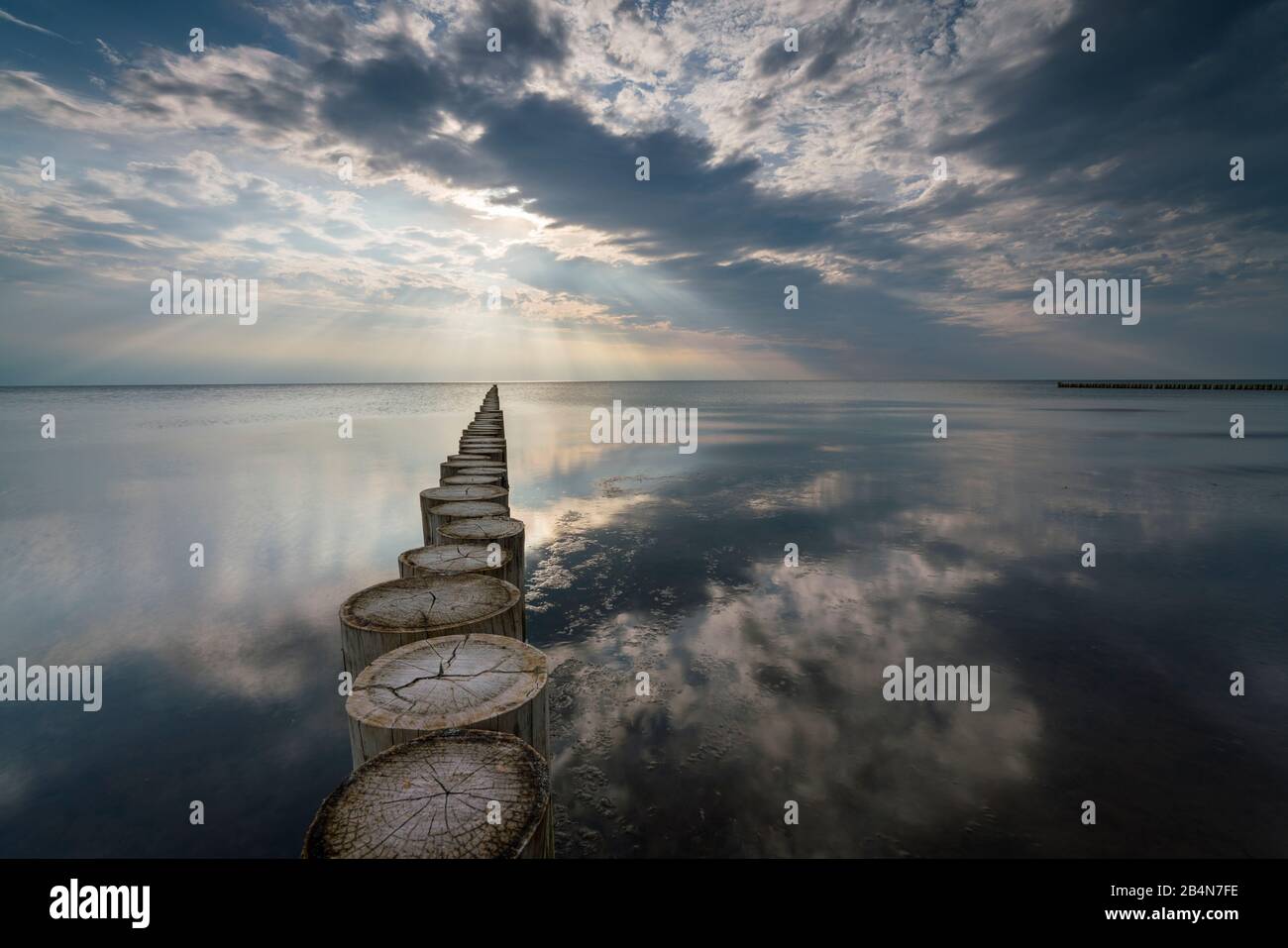 Baltic Sea in the evening light, long exposure, setting sun, dark ...