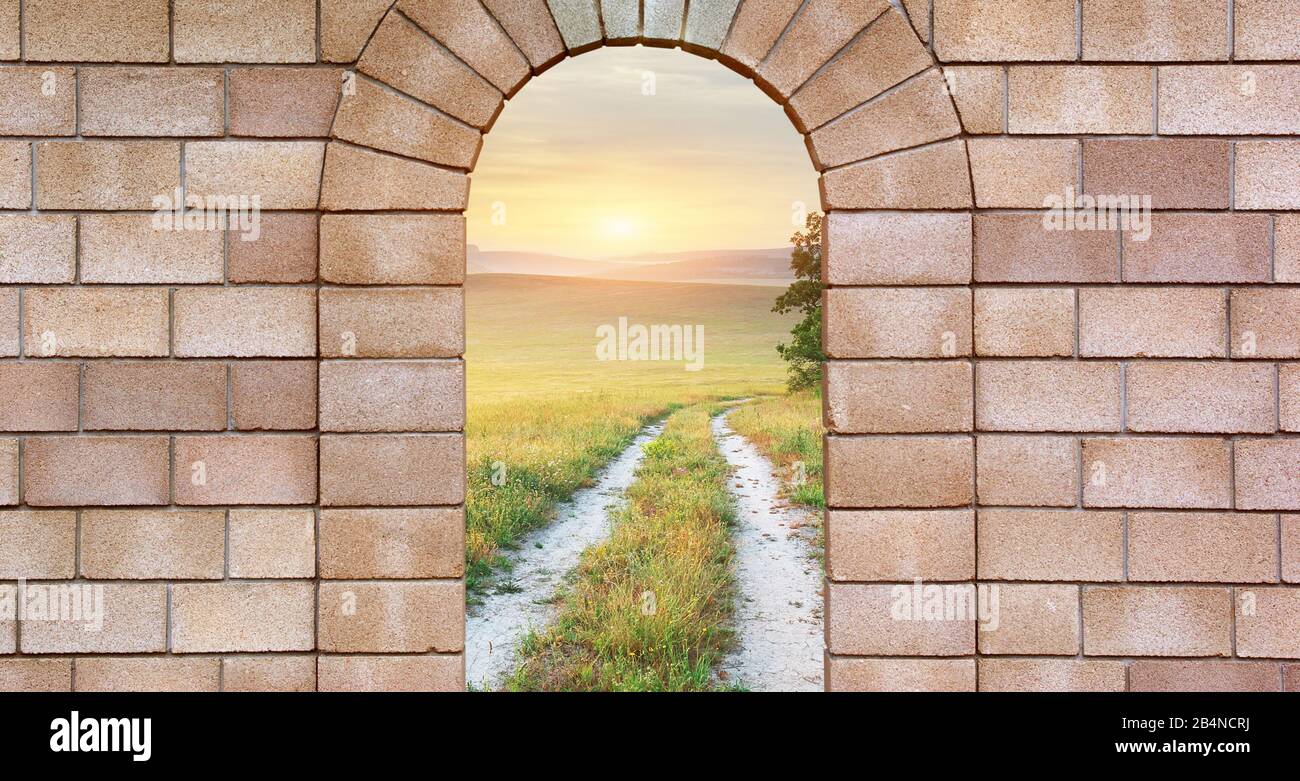 Arch from bricks and road to nature. Element of design Stock Photo - Alamy