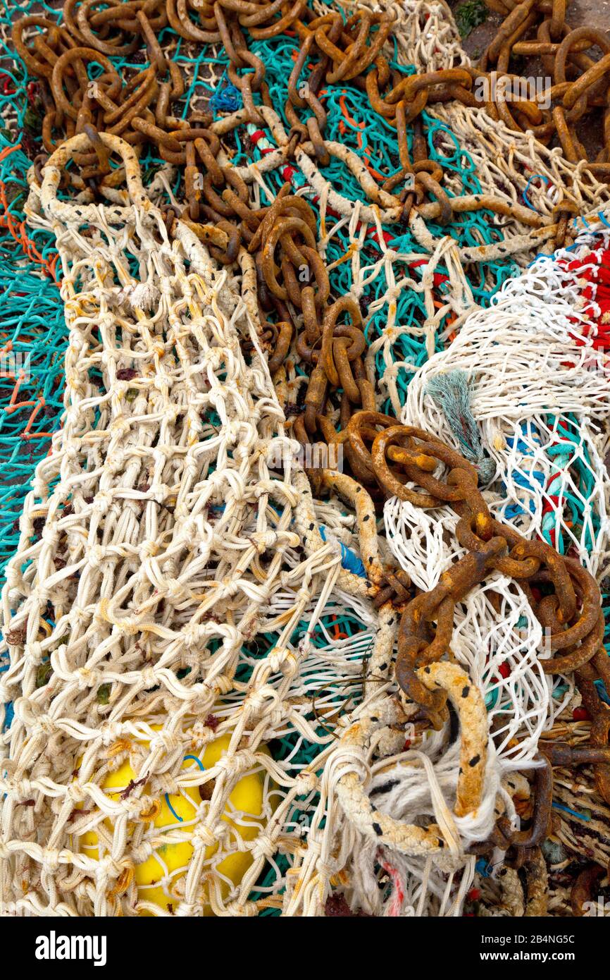 Colorful jumble of fishing nets iron chains in norwegian port hi-res ...